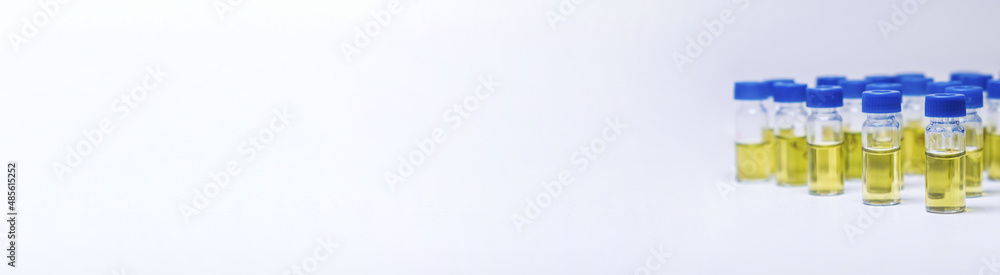 Banner with HPLC vials with urine sample for HPLC analysis in the ...