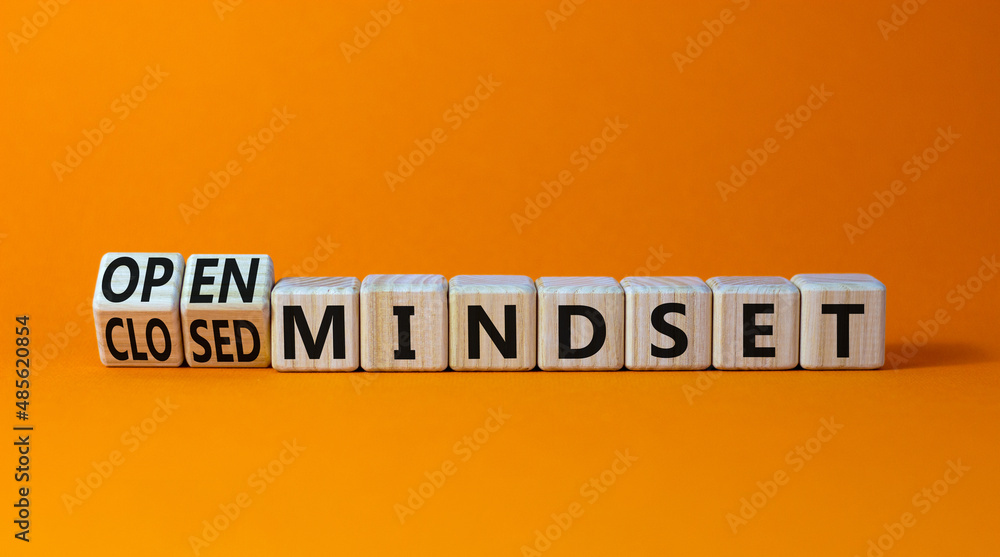 Open or closed mindset symbol. Turned wooden cubes and changed concept words closed mindset to ...