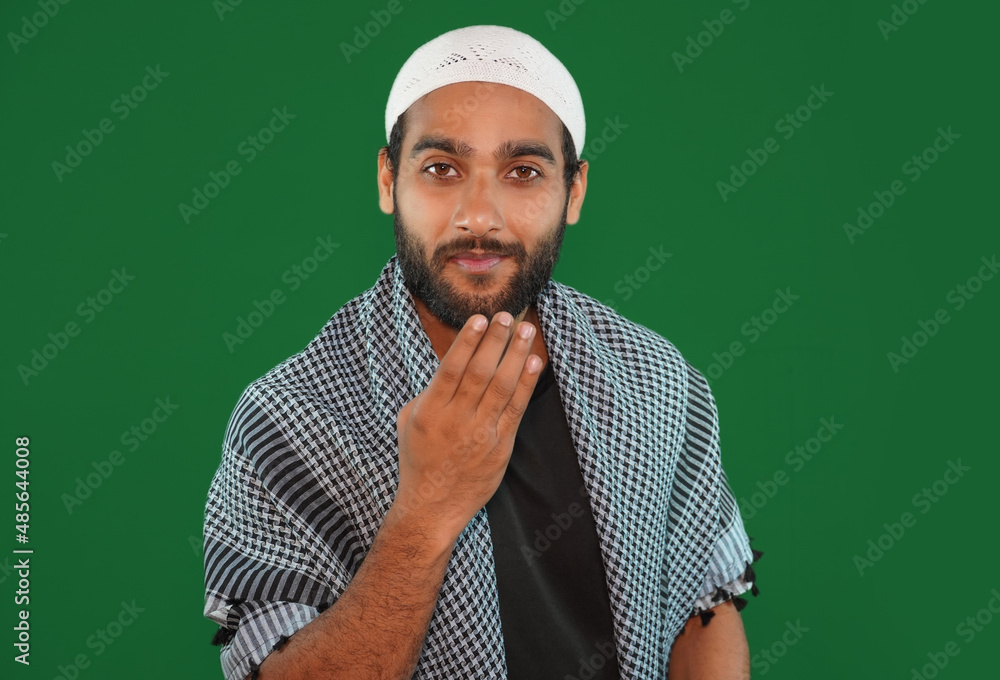 muslim boy saying hello on Green screen background. Stock Photo | Adobe ...