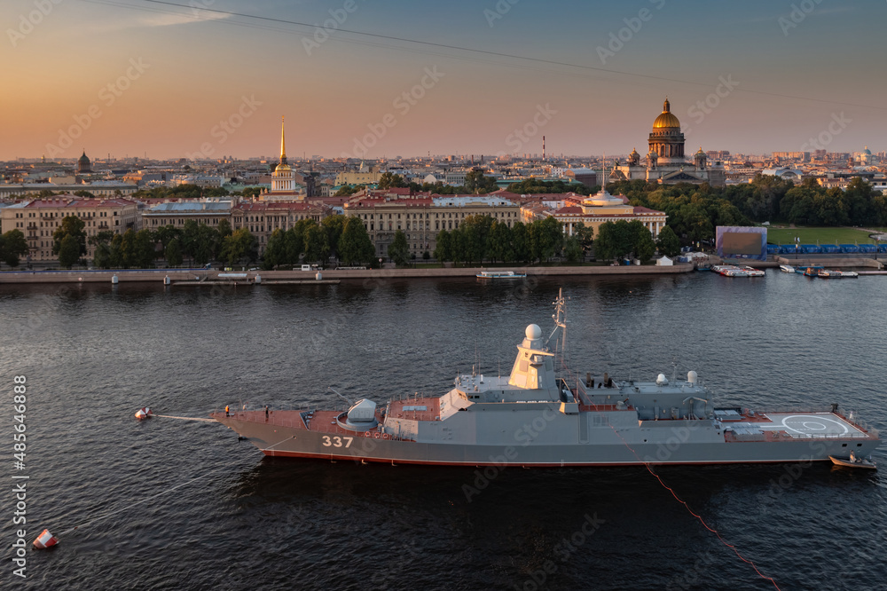 Aerial morning urban landscape with warships in the waters of the Neva ...