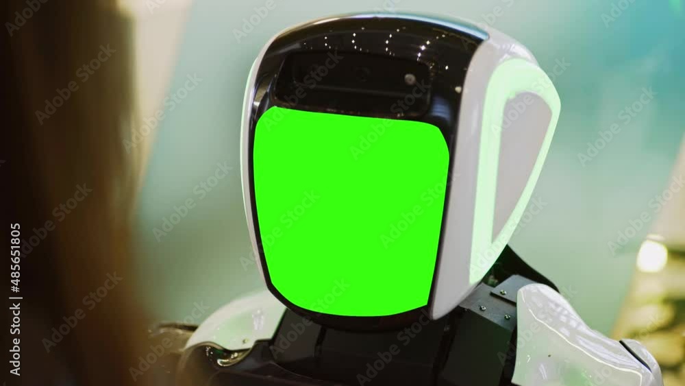 Smiling artificial smart robot with green screen, chroma key face ...