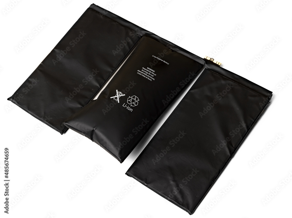 Damaged black swollen inflated Li-Ion polymer battery from the tablet ...