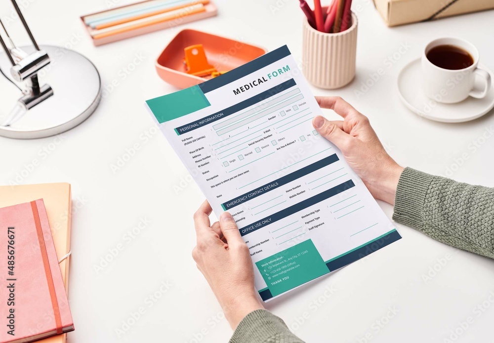 A4 Paper Mockup with Hands Holding Papers on Destop Stock Template ...