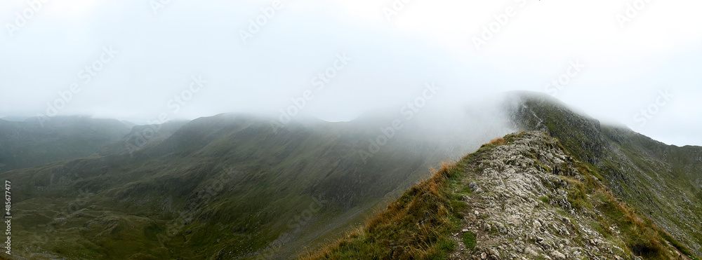 Striding edge, Helvellyn shrouded in morning mist Stock Photo | Adobe Stock
