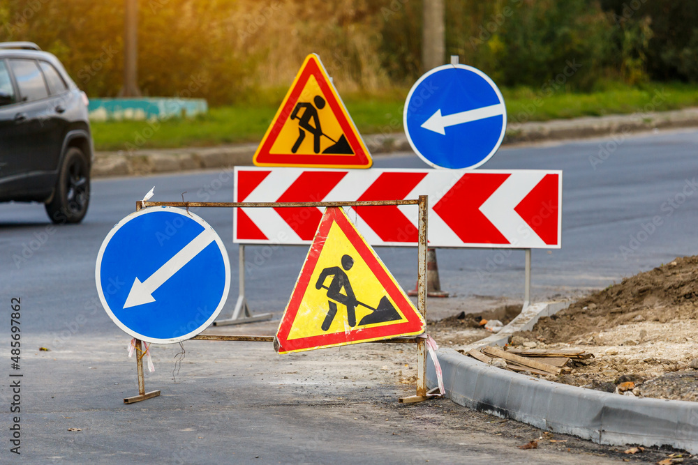 Road signs!Road works with trucks and traffic signs.road works road ...