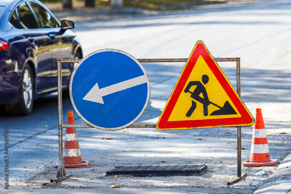 Road signs!Road works with trucks and traffic signs.road works road ...