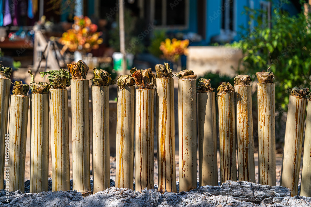 original burning Khao Lam glutinous sticky rice in coconut roasted in ...