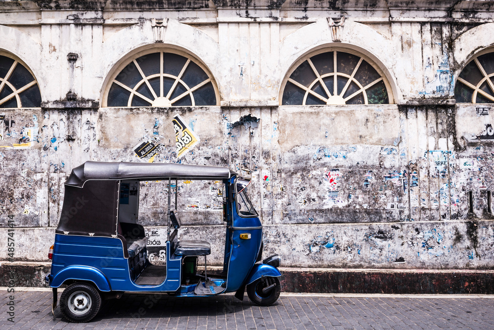 Photo of a tuk tuk in the Old Town of Galle, a UNESCO World Heritage ...