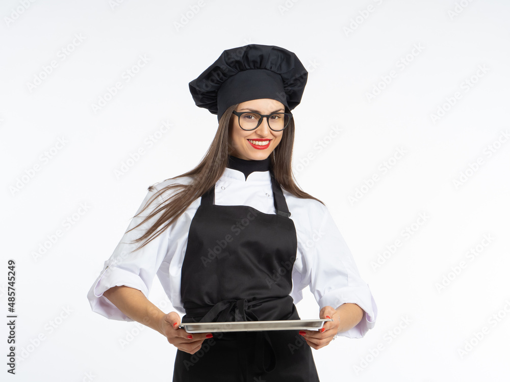 Chef shows empty tray. Woman chef smiling. Girl cook on white ...