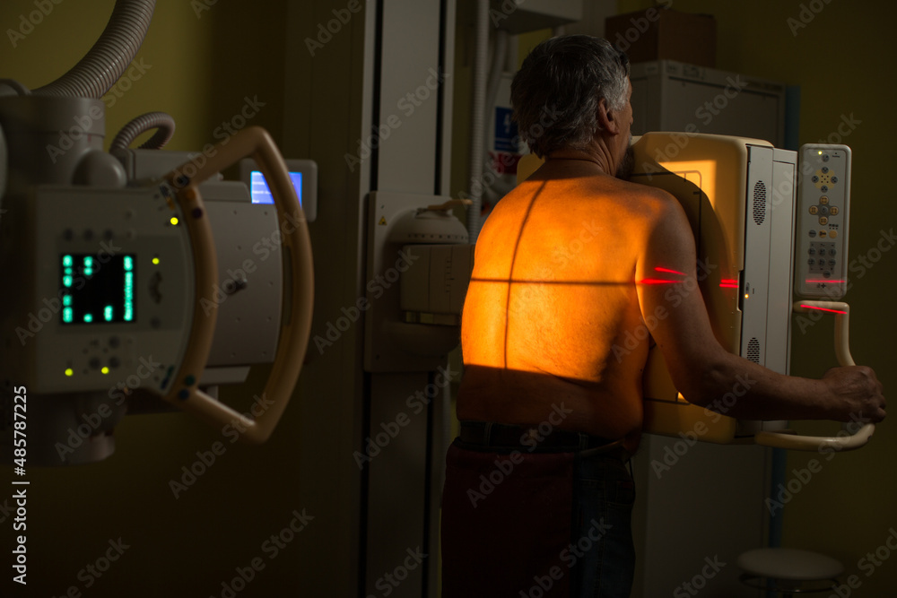 Senior man x-ray medical scan examination in a modern hospital (color ...