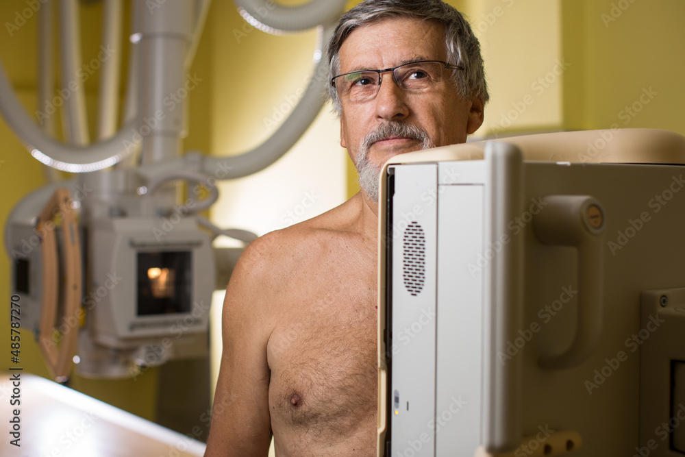 Senior man x-ray medical scan examination in a modern hospital (color ...
