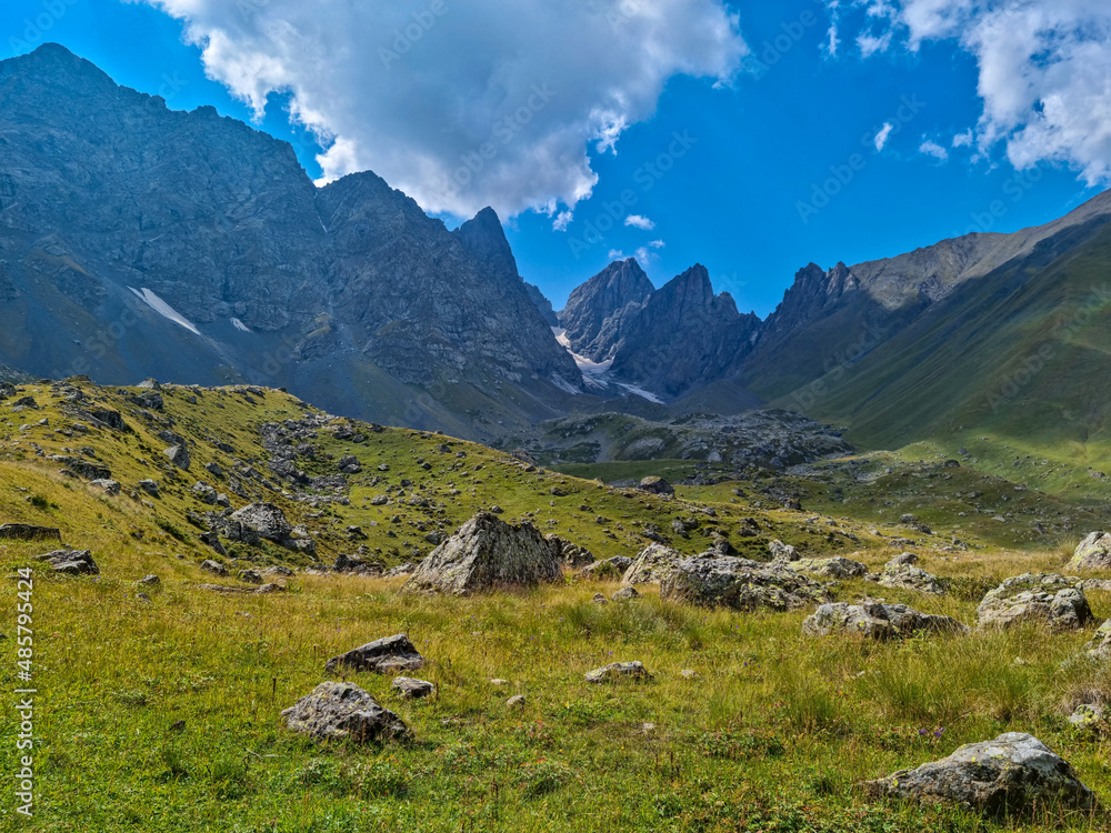 A panoramic view on the sharp mountain peaks of the Chaukhi massif in the Greater Caucasus ...