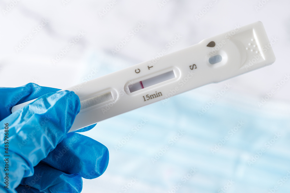 Hand showing Covid-19 negative result of rapid antigen test SARS CoV-2 ...