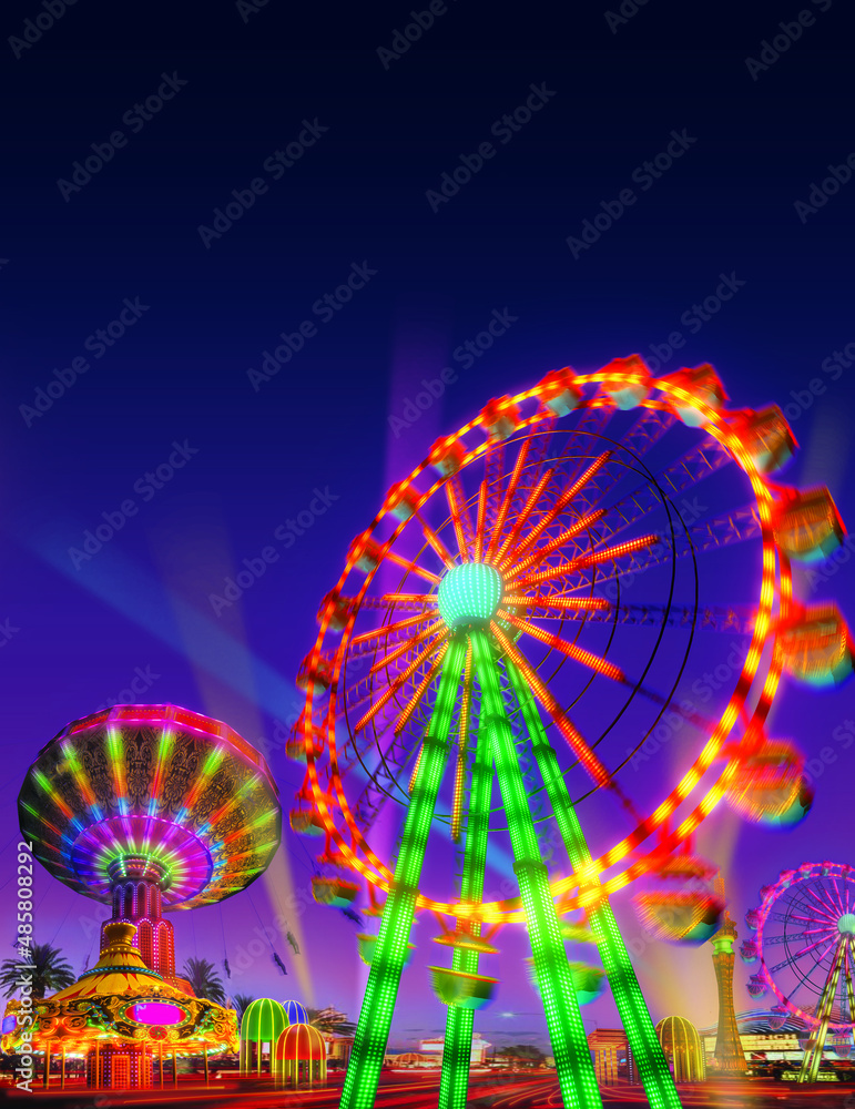 Theme park motor rides game in evening view isolated on night view blue ...