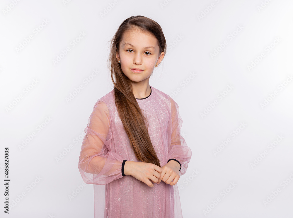 Portrait of a happy smiling child girl with long hair. Cute 8 years old ...