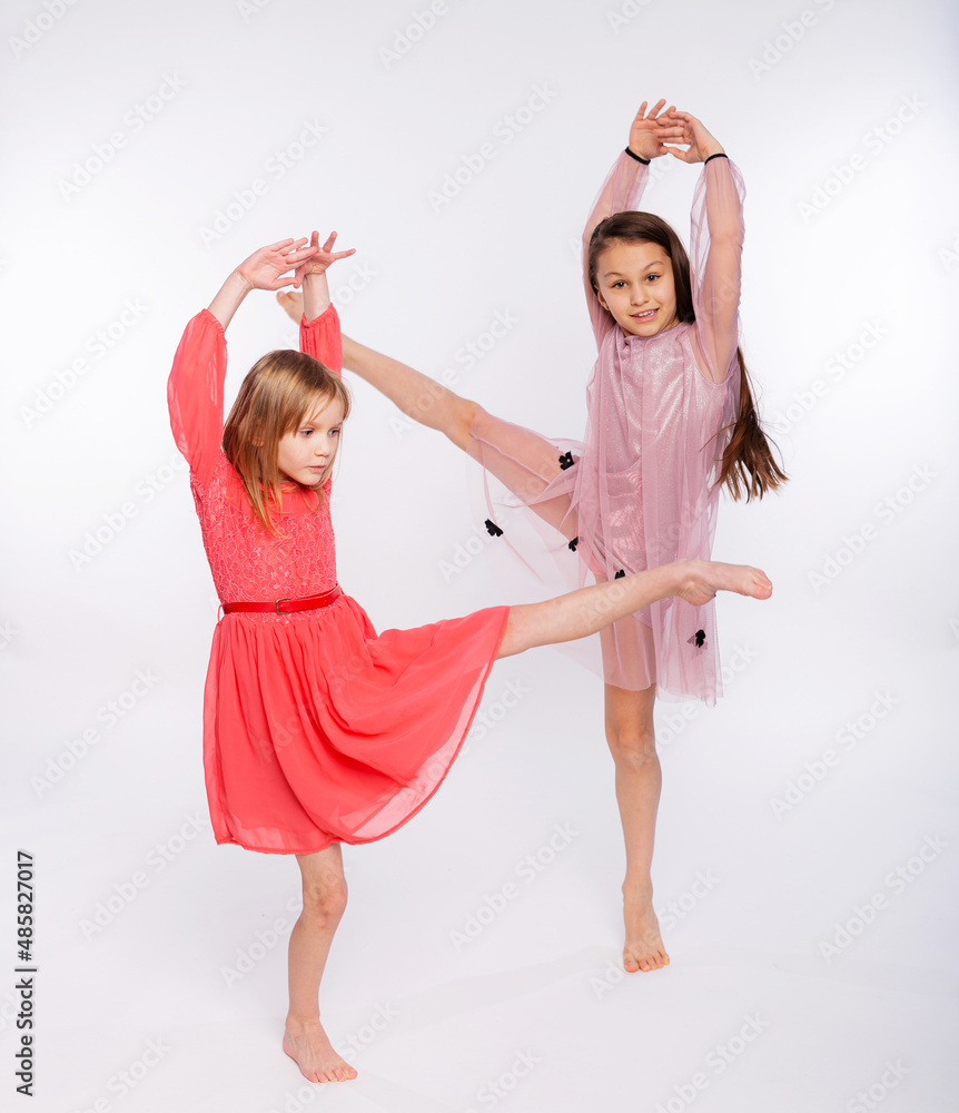 Playful kids, funtime concept. Portrait of cute two girls 6-8 years old ...