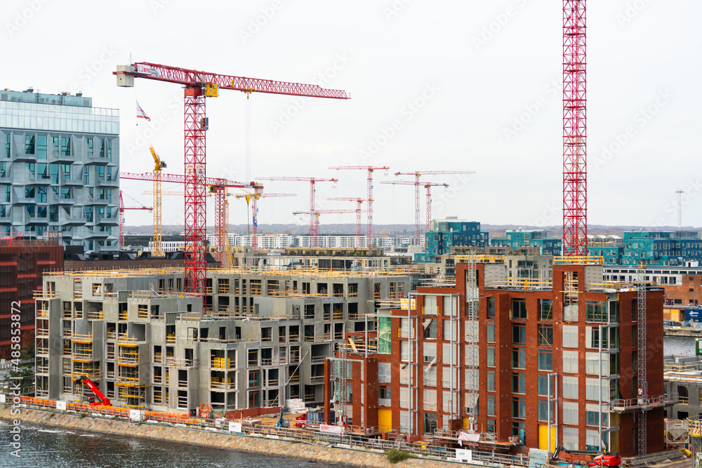 Busy construction site in an expanding urban environment with tall ...