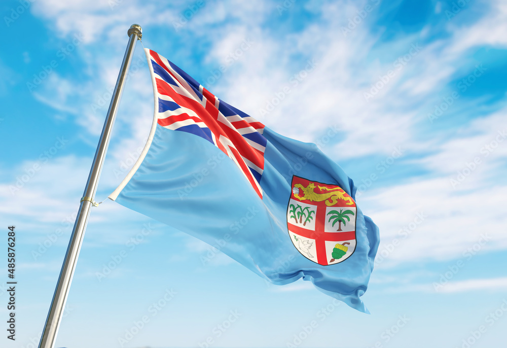 3d rendering Fiji flag waving in the wind on flagpole. Perspective wiev Fiji flag waving a blue ...