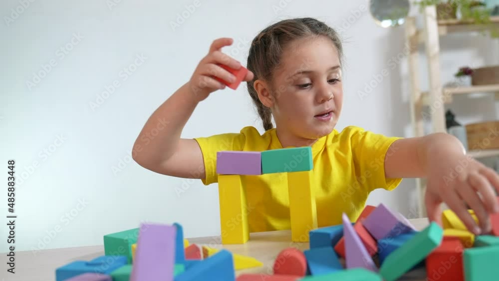child play with cubes a toys blocks. childhood kindergarten kid happy ...