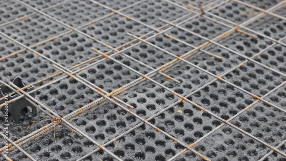 Wideo Stock: Reinforcement for reinforced concrete bonded over the ...