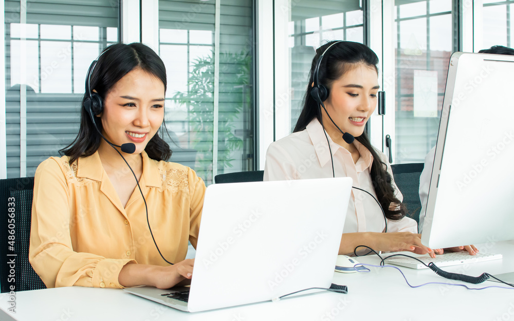 Focus Asian beautiful attractive female call center cheerful happily ...