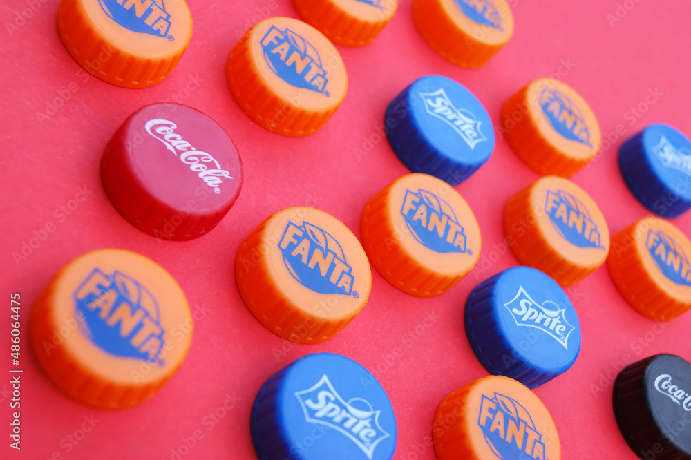 plastic caps from different drinks soda. Popular brands: Coca Cola ...