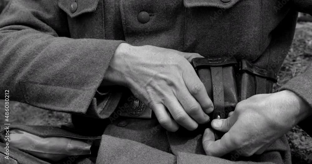 World War II German Soldier Cleaning Rifle. Soldier Preparing Weapon ...