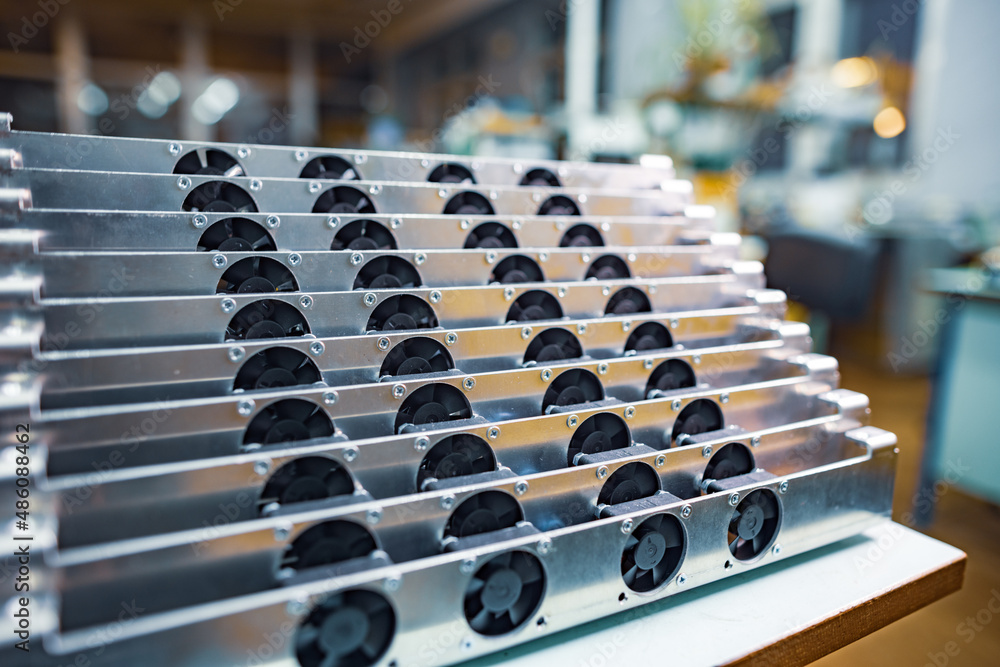 Modern metal parts of TFT displays on a table in a workshop Stock Photo ...