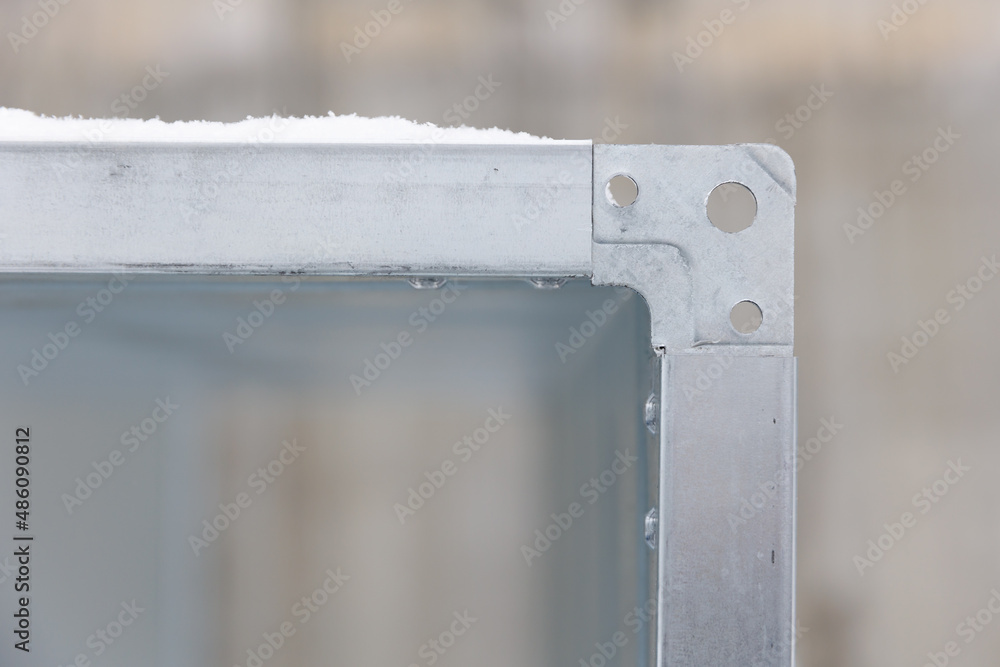 holes in the corners of the ventilation shaft block. Assembly and ...