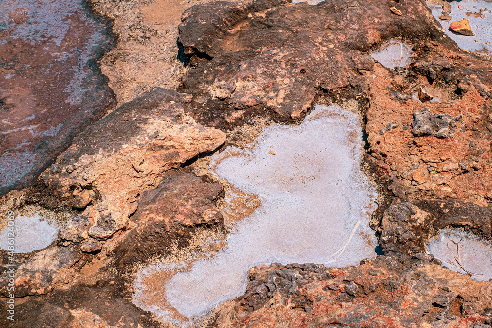 salt crystals on limestone rock, Blue Lagoon, Camino island, Malta ...