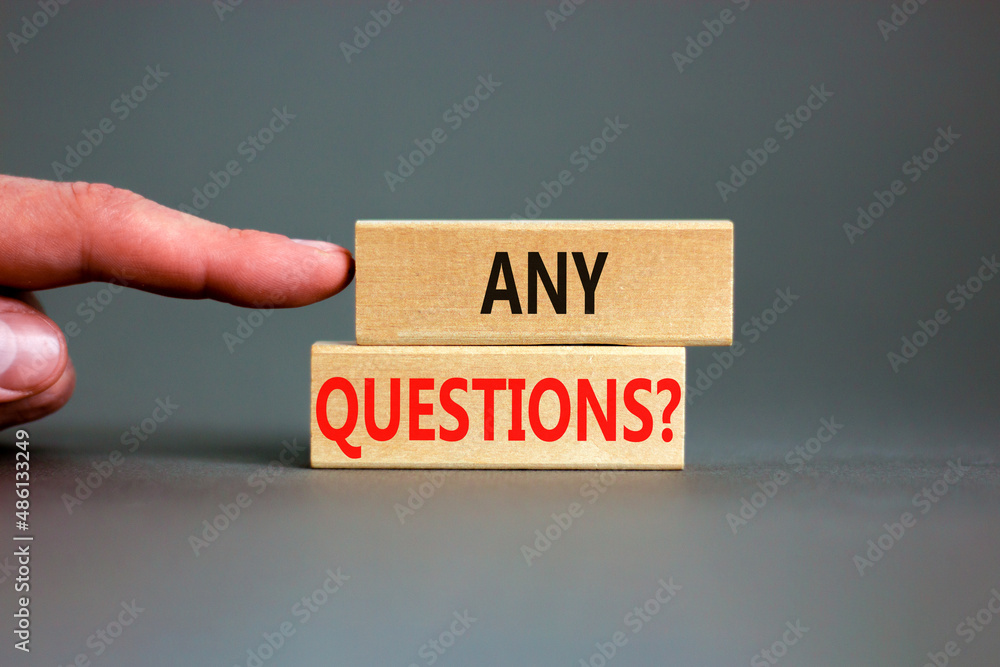 Any questions symbol. Concept words Any questions on wooden blocks on a ...