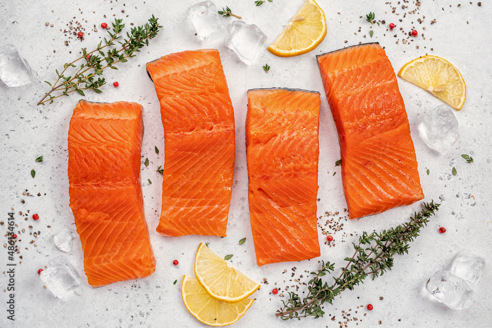 Salmon. Fresh raw salmon fish fillet with cooking ingredients, herbs ...