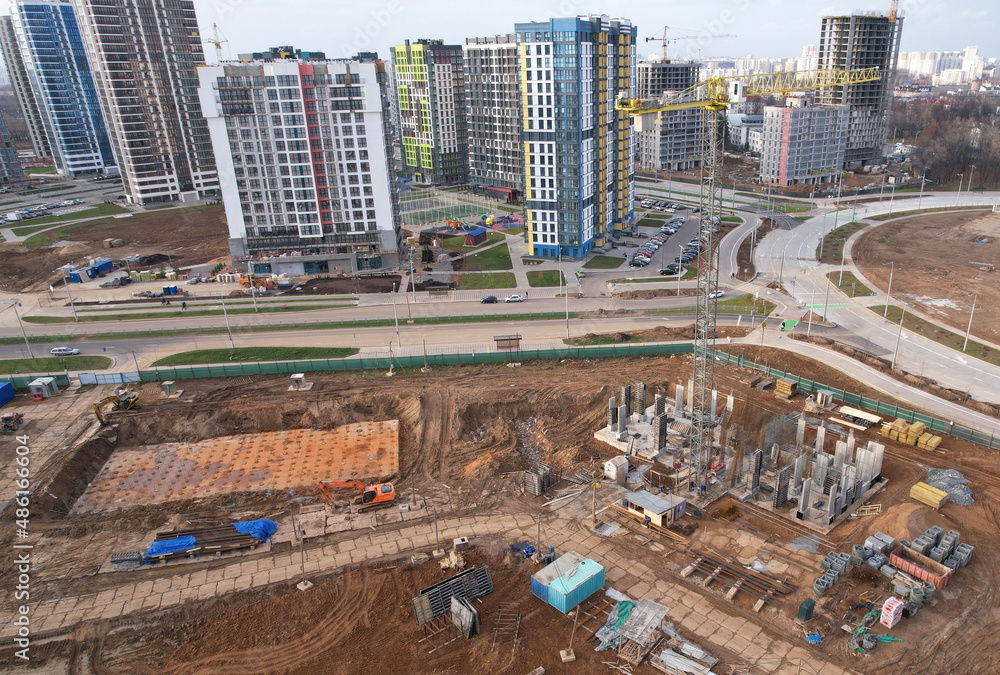 Construction site with tower cranes on formwork building construction ...