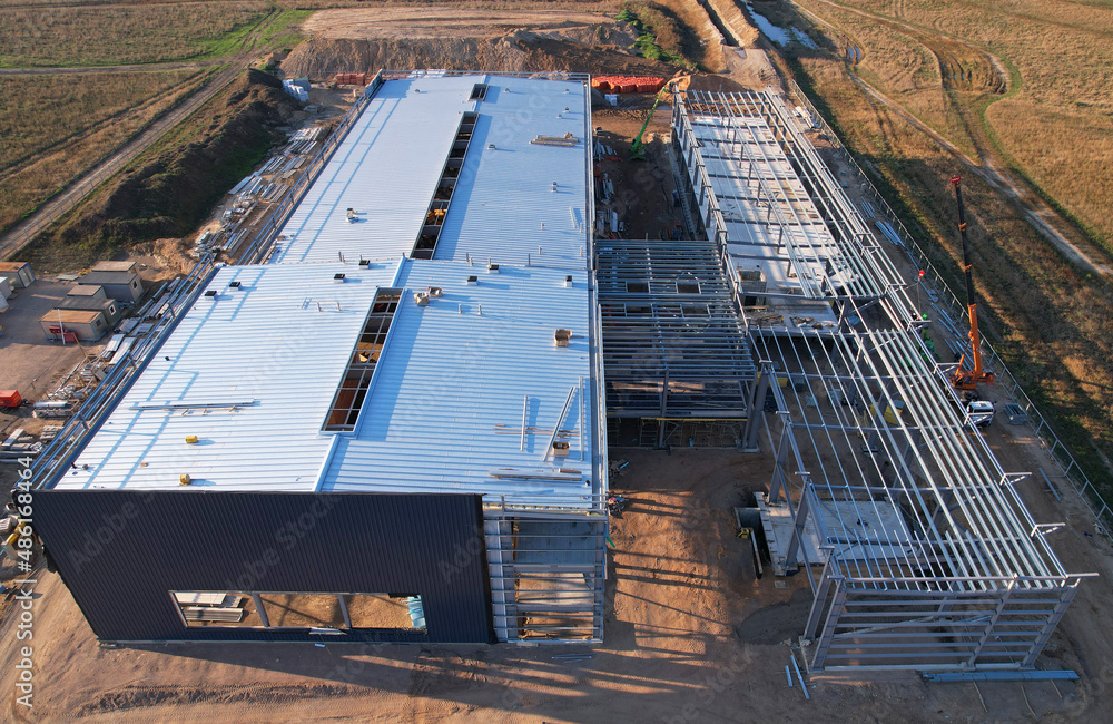 Warehouse Construction from metal structure. Industrial building on ...