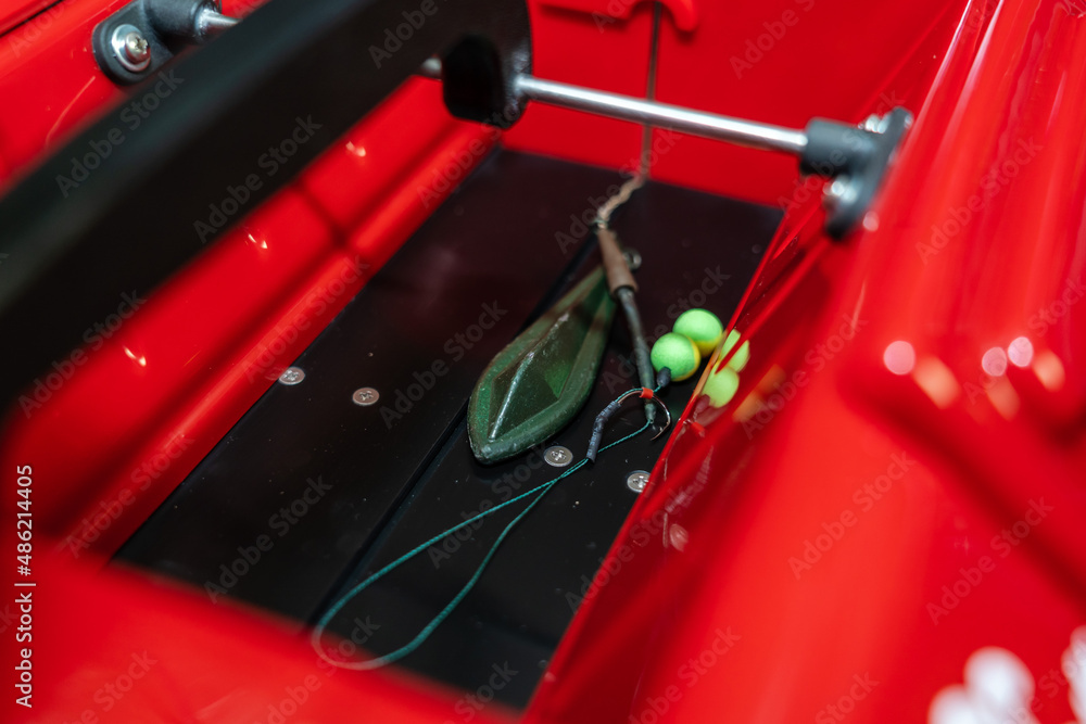 Setting up a carp boat for bait for fishing Stock Photo | Adobe Stock