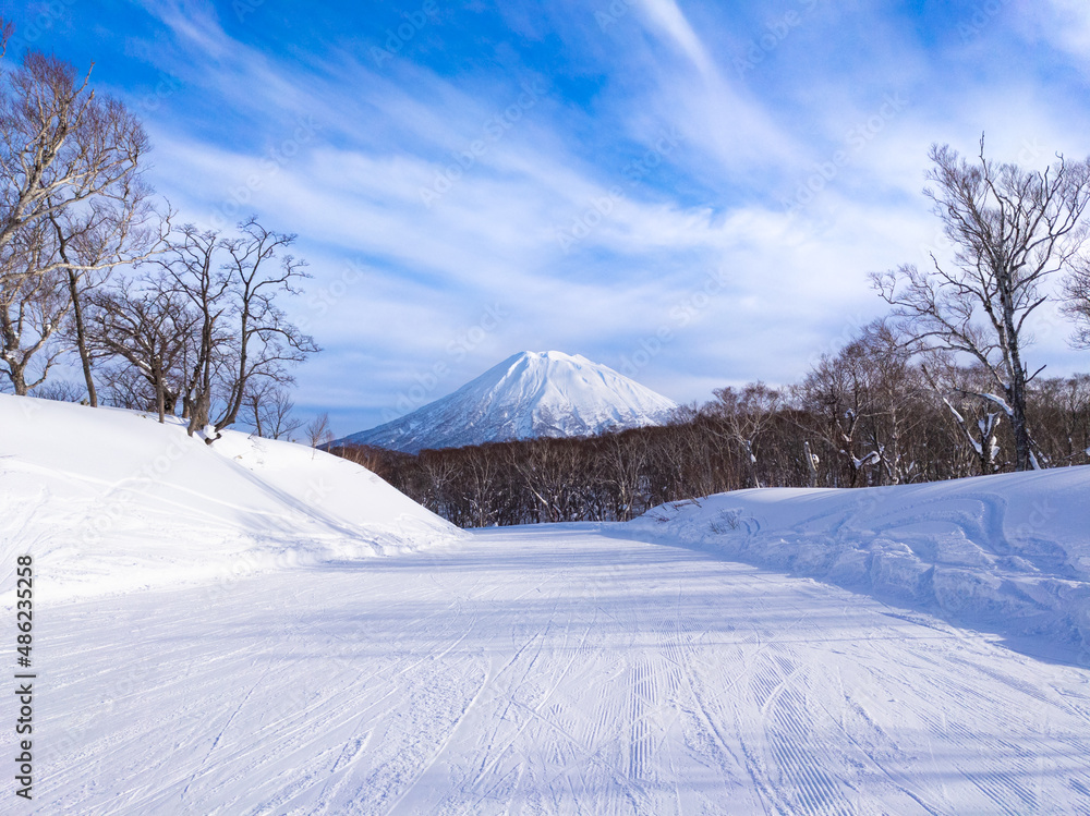 Slope with a view of snowy volcano (Niseko, Hokkaido, Japan) Stock ...