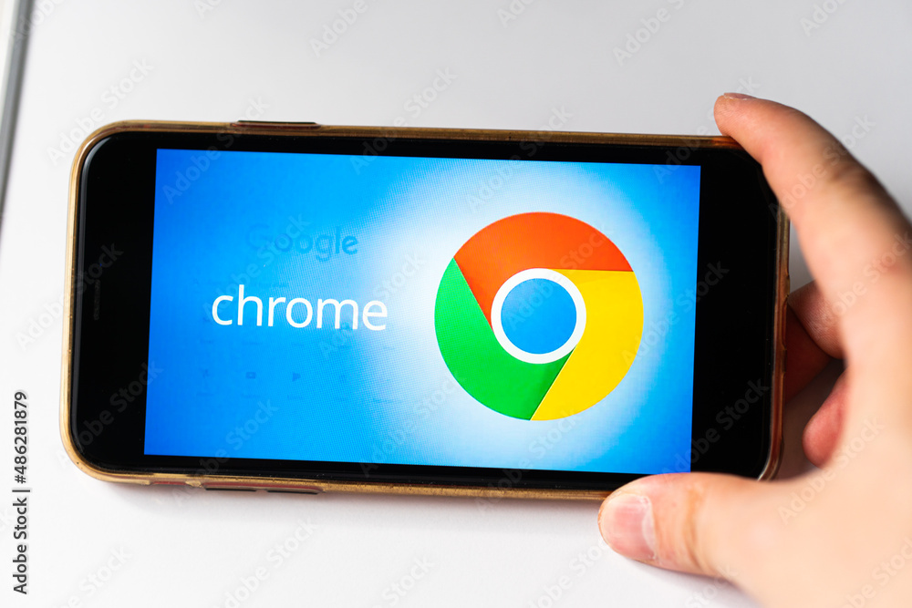 Google Chrome application icon on Apple iPhone screen close-up. Google ...