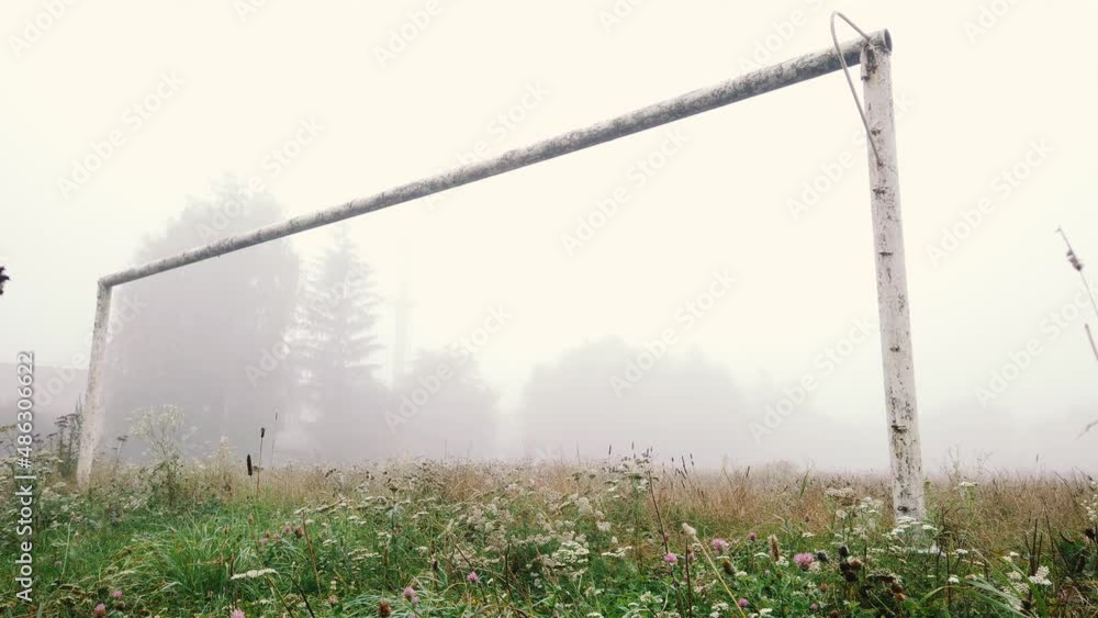 Abandoned football field and old goal post in fall fog. Autumn misty ...