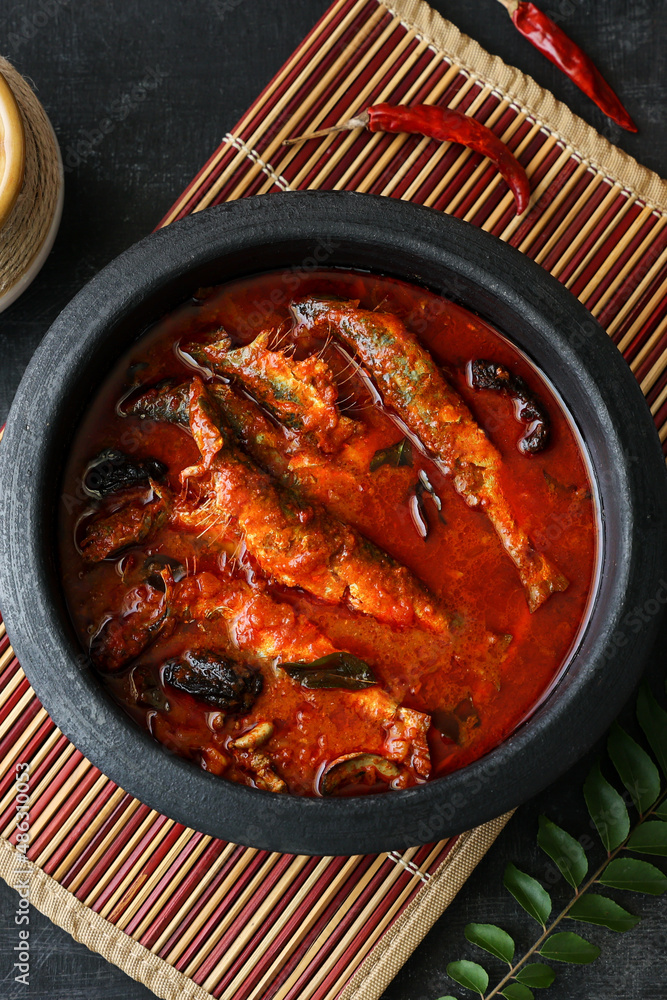 Top view of Sardine fish curry hot spicy Kerala masala fish curry for ...