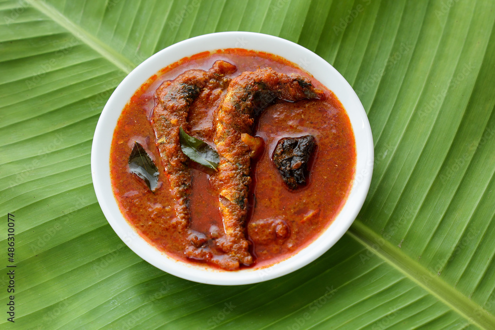 Top view of Sardine fish curry hot spicy Kerala masala fish curry for ...