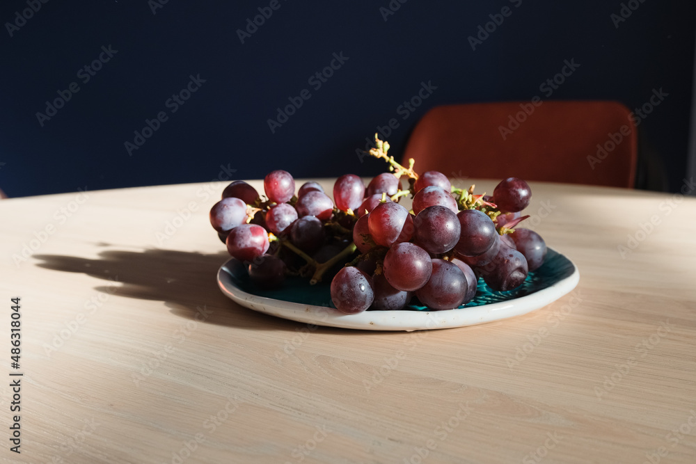still life with red grapes Stock Photo | Adobe Stock