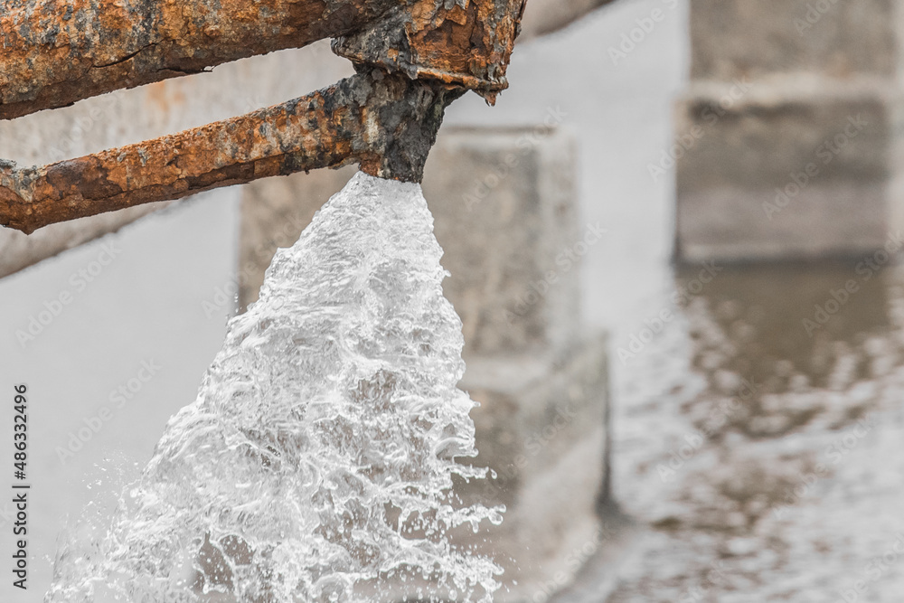 Old steel rusty pipes of the water cooling pipeline system of the ...