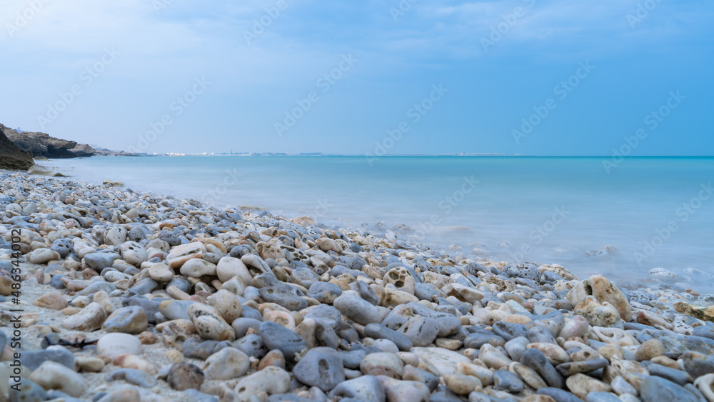 Beautiful Jebel Fuwairit Beach with pebbles in Qatar. Stock Photo ...