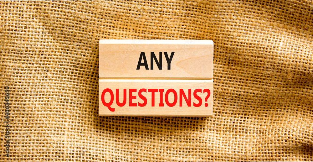 Any questions symbol. Concept words Any questions on wooden blocks on a ...
