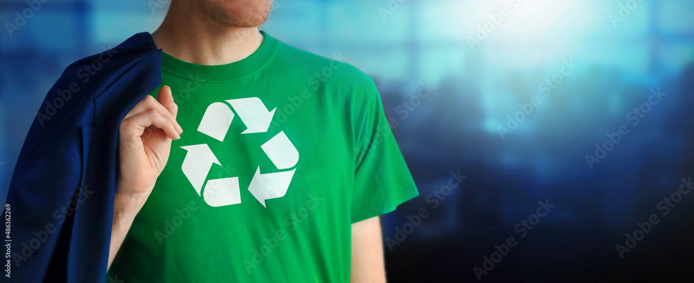 Man showing chest with Recycling Symbol logo on green t-shirt ...