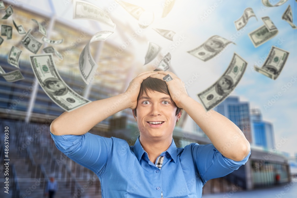 Happy man for winning a sport bet. Rain of money inside a soccer ...