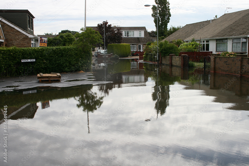 flood disaster zone, flooded houses and streets, flash flooding extreme ...