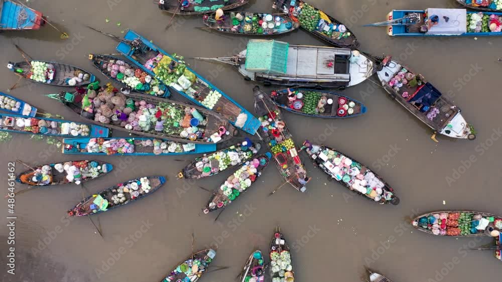 Busy boats are trading on the river. This place is very attractive to ...