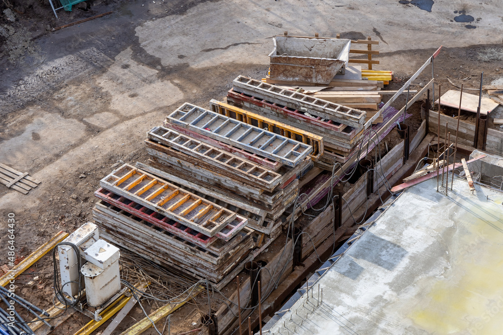 Stacked aluminum formwork at a construction site. Cast concrete in the ...