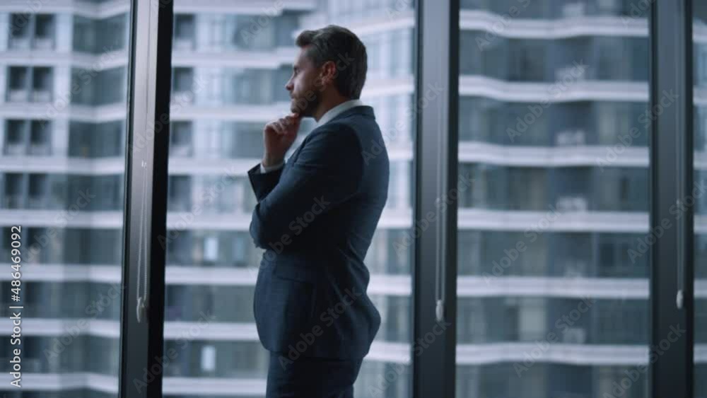 Boss man standing alone crossing hands thinking career in corporate ...